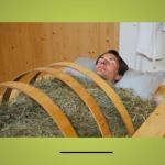 Die wohltuende Wirkung eines Heubads